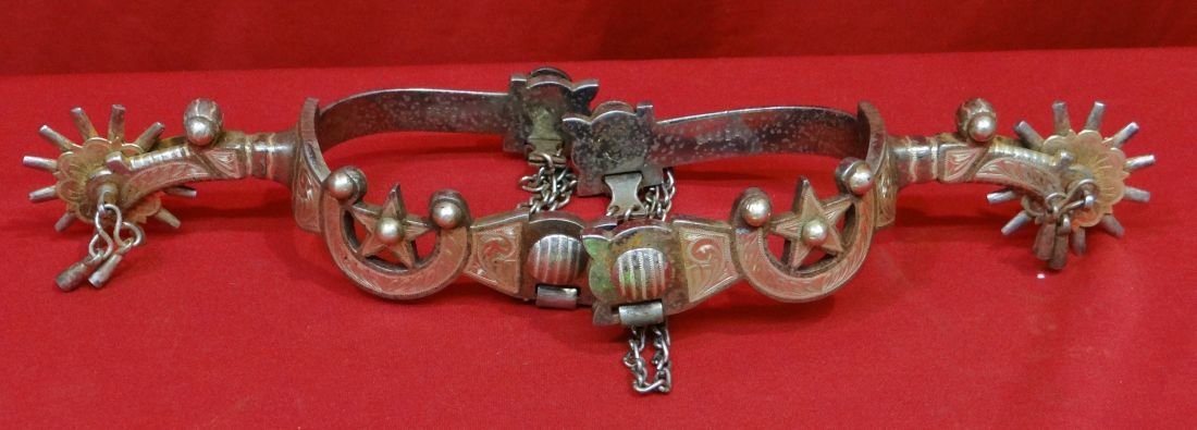 Garza marked spurs, silver inlay, jingle bobs, show some rust
