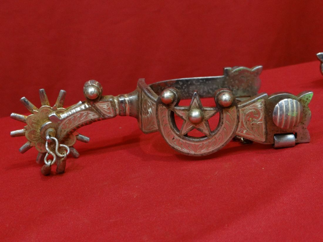 Garza marked spurs, silver inlay, jingle bobs, show some rust
