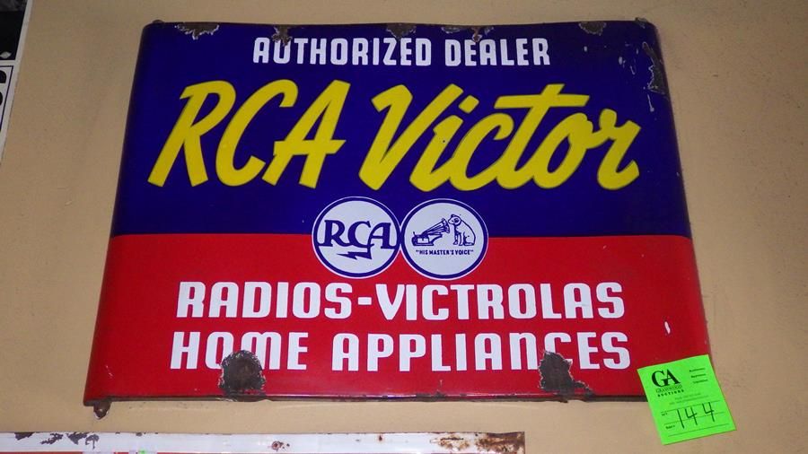RCA Victor wall clock, two RCA Victor metal signs