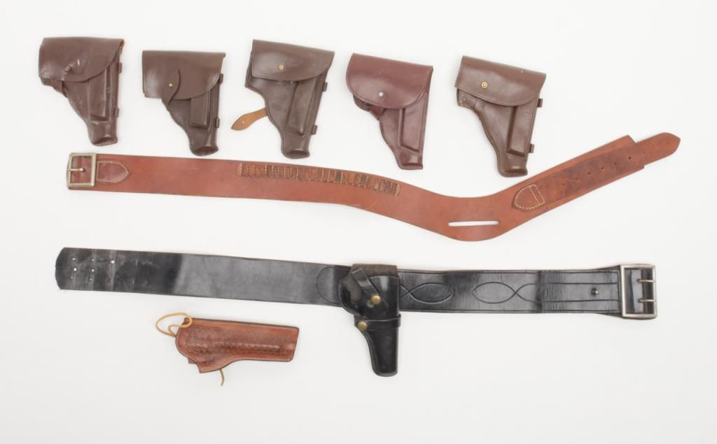 Bonanza leather lot of seven holsters and two belts. The lot includes ...