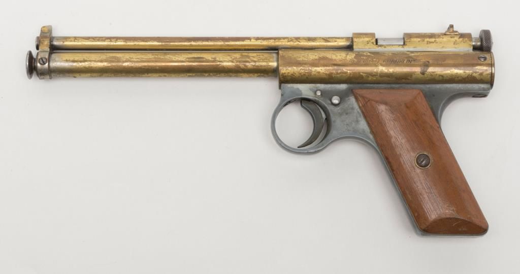 Benjamin Franklin air pistol with wood grips. Est.: $50-$100.