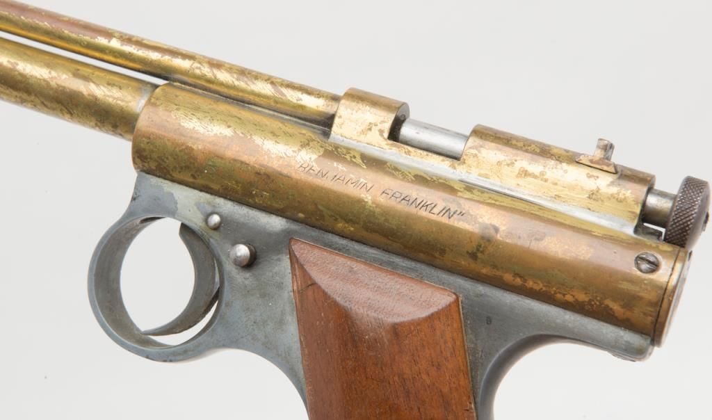 Benjamin Franklin air pistol with wood grips. Est.: $50-$100.