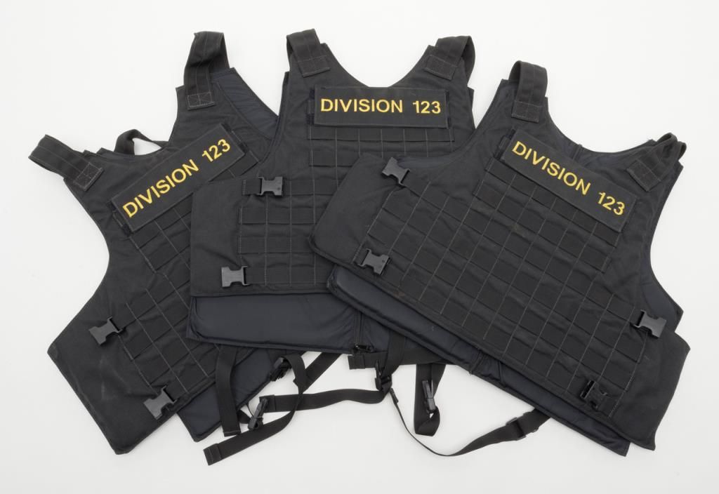 Three prop police vests from the film “Cartel Wars”; replica body armor ...