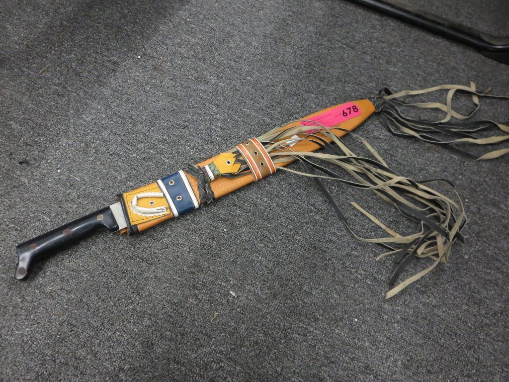 Peruvian knife in decorated sheath