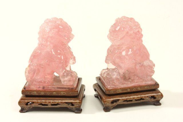 Pair pink quartz foo dogs on stands