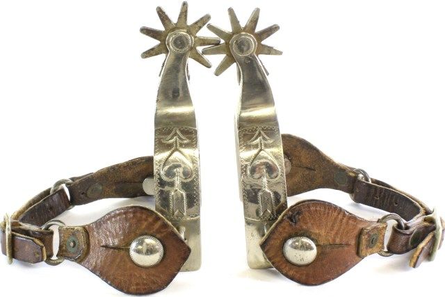 Pair Kelly marked spurs single mount with heart