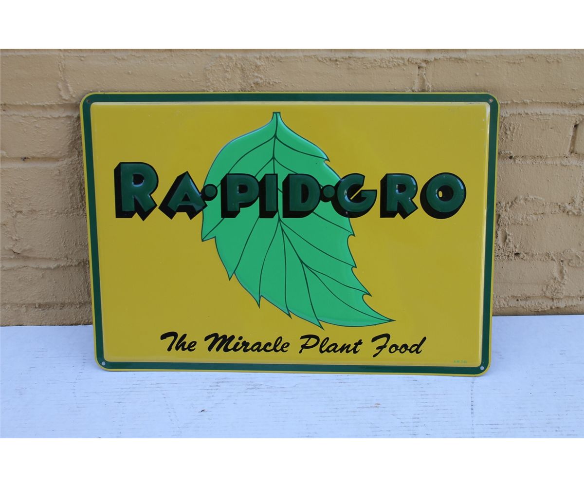 Rapid Grow Fertilizer Plant Food Tin NOS Embossed Sign, 1965 20" x 14"