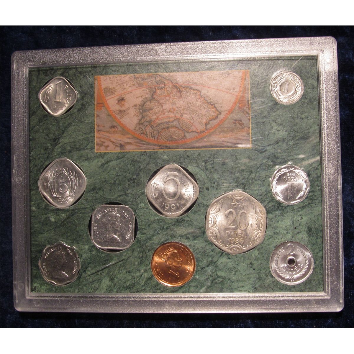 786. Cased Set "Odd Shaped Coins of the World" 10 pcs. BU.