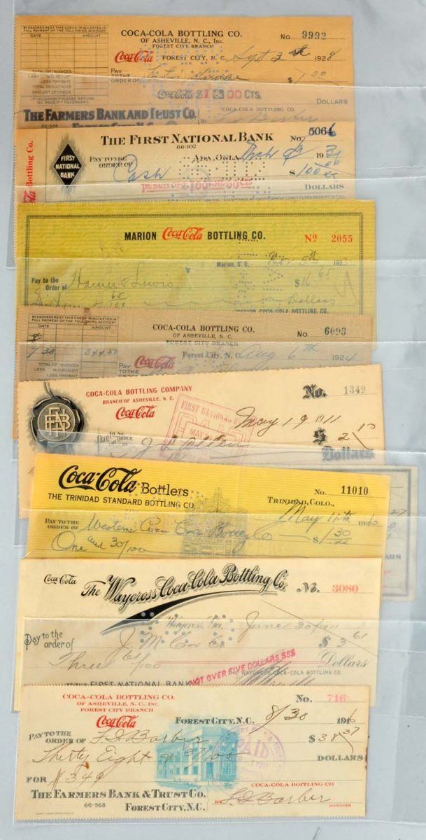 Lot of 9: Coca-Cola Checks.