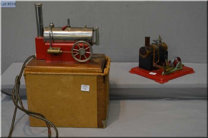 Vintage toy steam engine and a Weeden electric powered engine