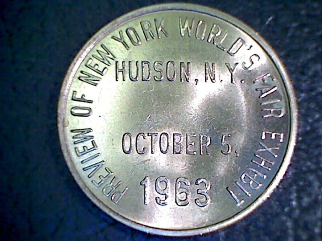 258. Oct. 5th, 1963 New York World's Fair Medal depicting Dinosaur. Gem BU.