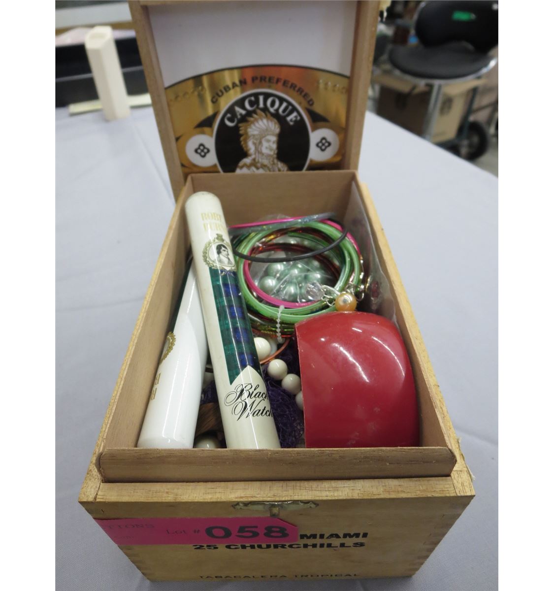 Wood Indian cigar box & contents