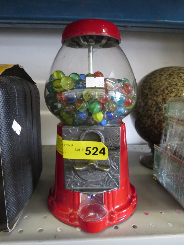 Gumball machine filled with glass marbles