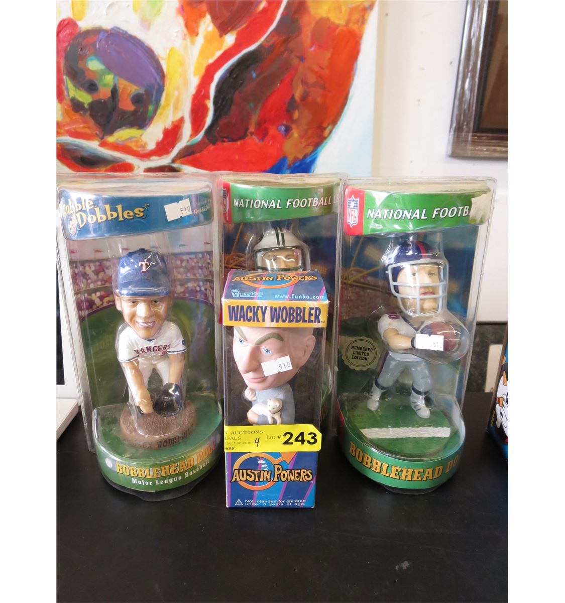 4 Bobble Heads in original boxes