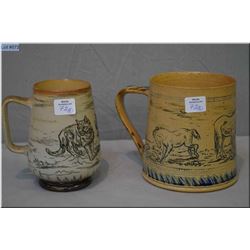 Two Doulton Lambeth glazed stoneware mugs, one decorated with cats and ...