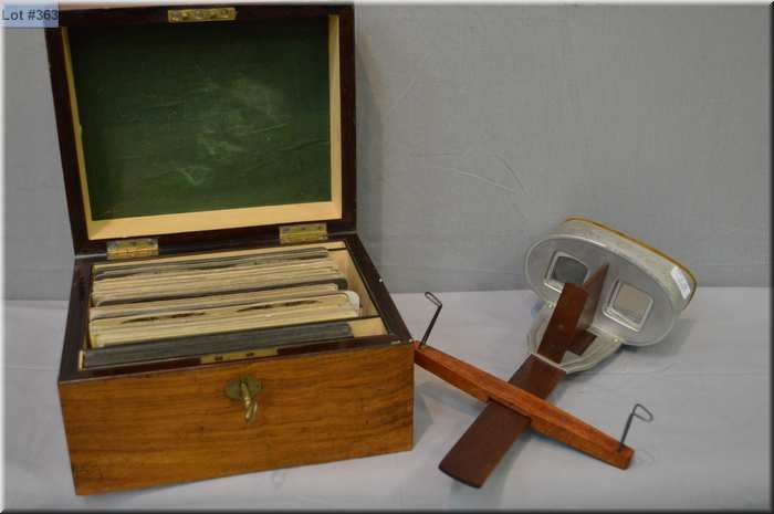 Black walnut fitted stereoscope box with slides including glass plus a ...