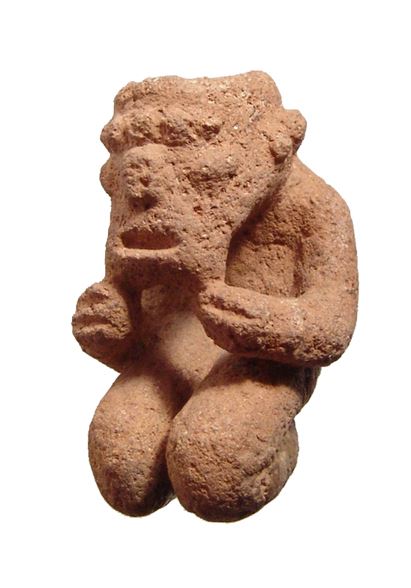 Costa Rican stone figure of a seated male