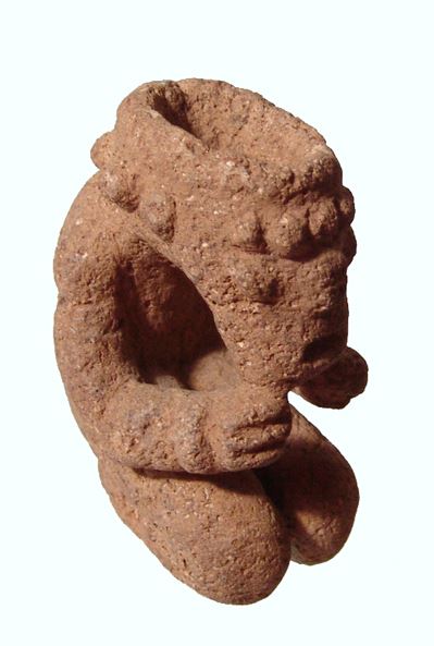 Costa Rican stone figure of a seated male