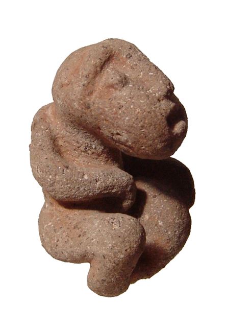 Costa Rican stone figure of a seated male