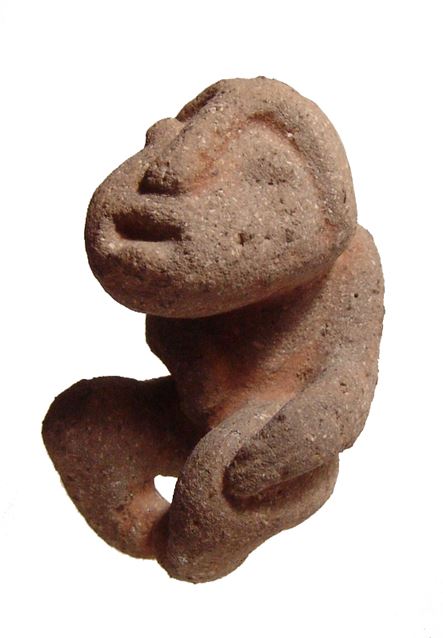 Costa Rican stone figure of a seated male
