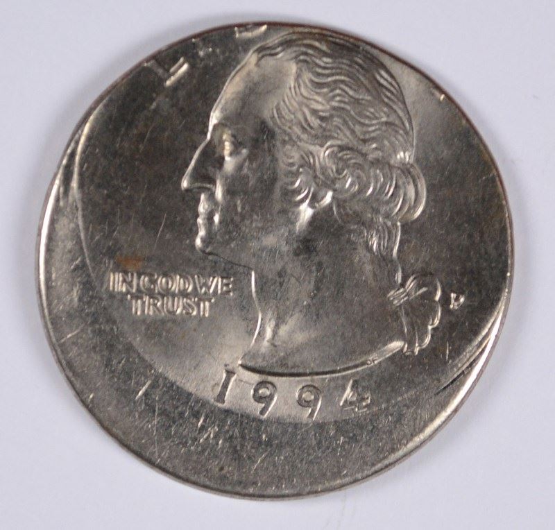 1994 WASHINGTON QUARTER (MAJOR MINT ERROR- OFF CENTER)