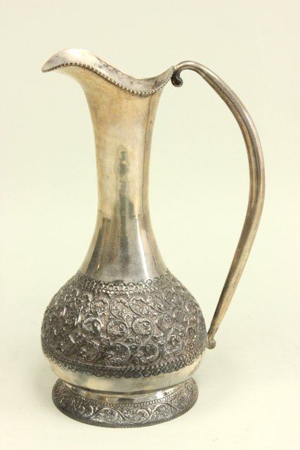 Middle Eastern style silver pitcher