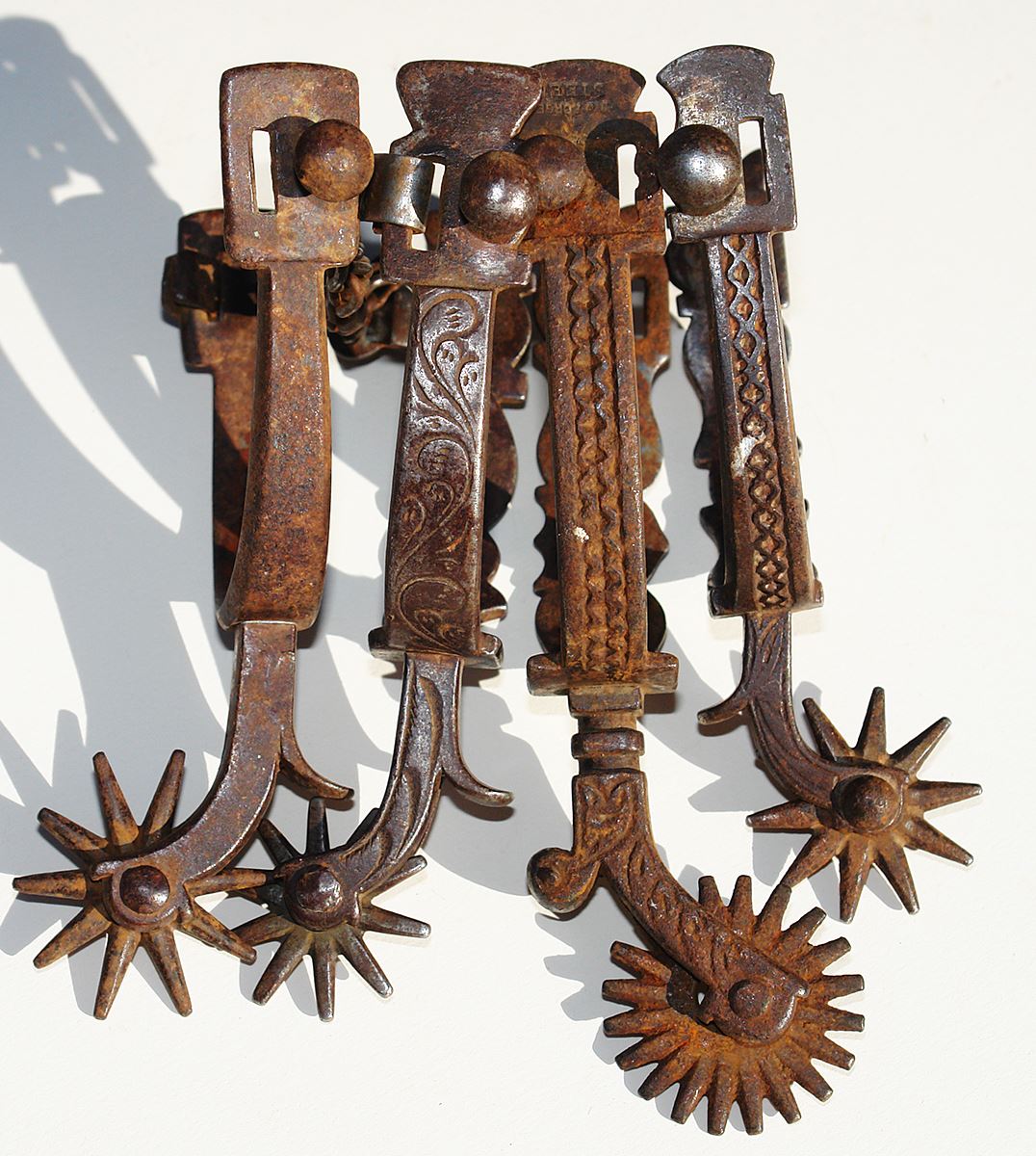 4 Buermann and Calif silver inlaid single spurs