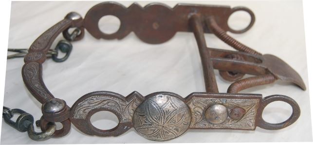 Calif silver inlaid spade with lead filled conchos