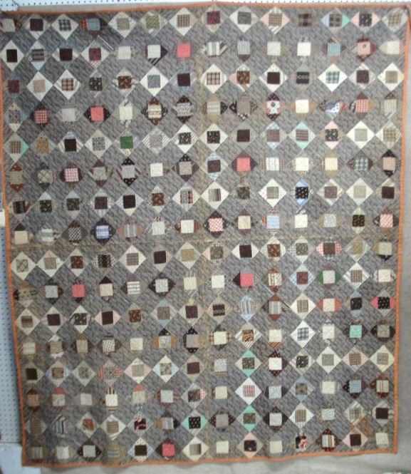 Patchwork quilt in earth tone colors, late 19th to early 20th century ...