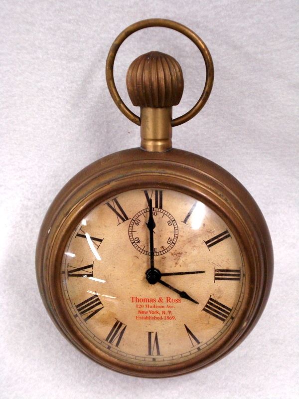 Lot of three battery operated novelty clocks/watches including a ...