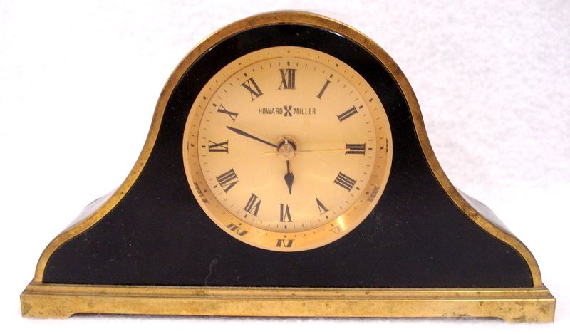 Lot of three battery operated novelty clocks/watches including a ...