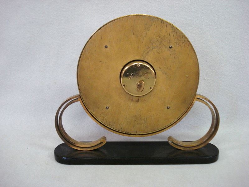 A German zodiac clock by F. Mauthe on black base, with brass roman ...