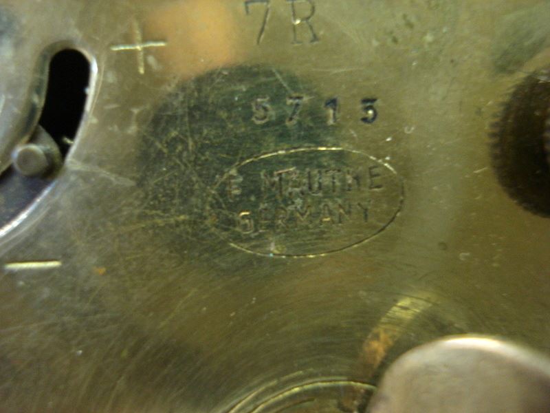 A German zodiac clock by F. Mauthe on black base, with brass roman ...