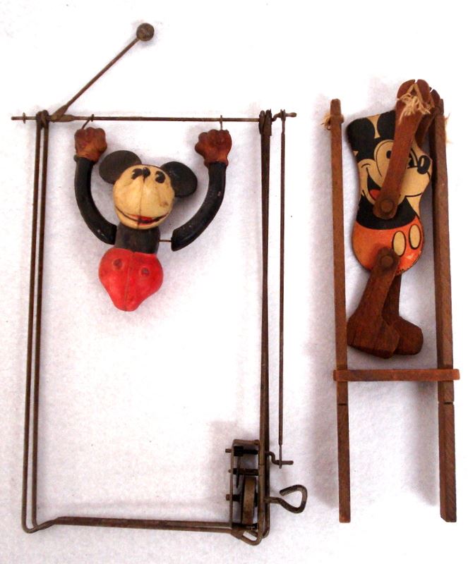 Two early Mickey Mouse trapeze toys: The first toy, distributed by Geo ...