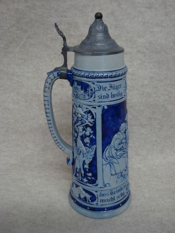 Two salt glazed German beer steins including a massive hand thrown ...
