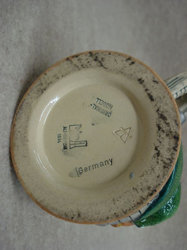 Four German beer steins including three from the Albert Jacob Thewalt ...