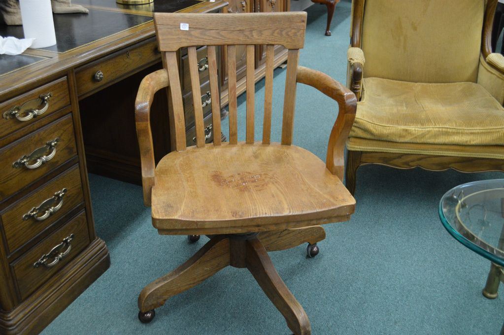 Vintage oak swivel open arm office chair made by Roxton