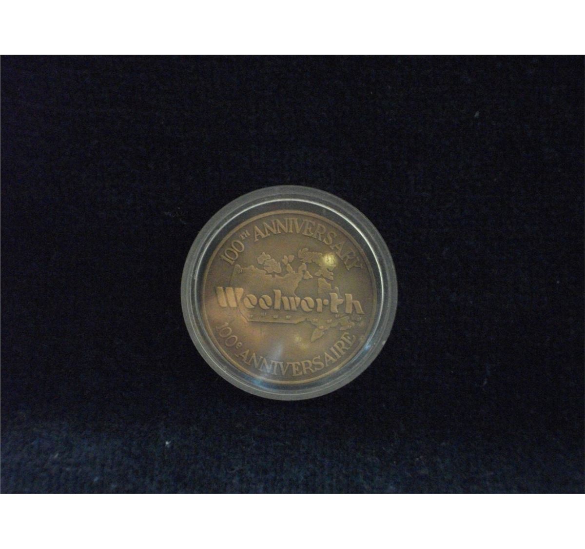 1979 100TH ANNIVERSARY WOOLWORTH COMMEMORATIVE COIN (L821 - 21)