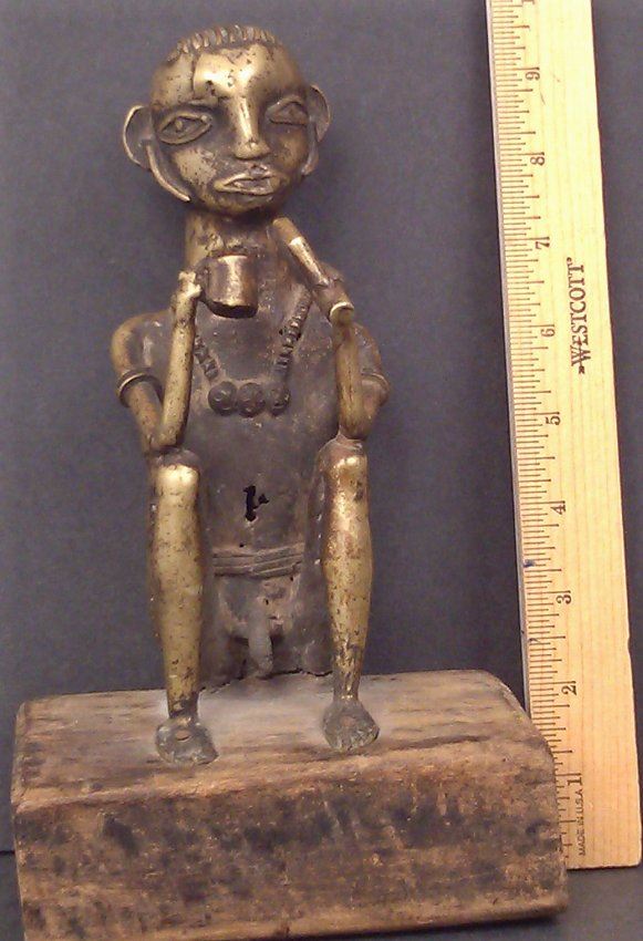 A bronze statuette of a Naga Tribe bushman art