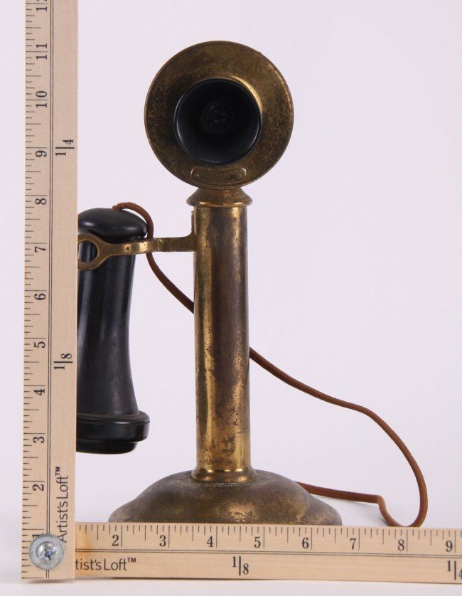 Western Electric brass candle stick telephone. Last