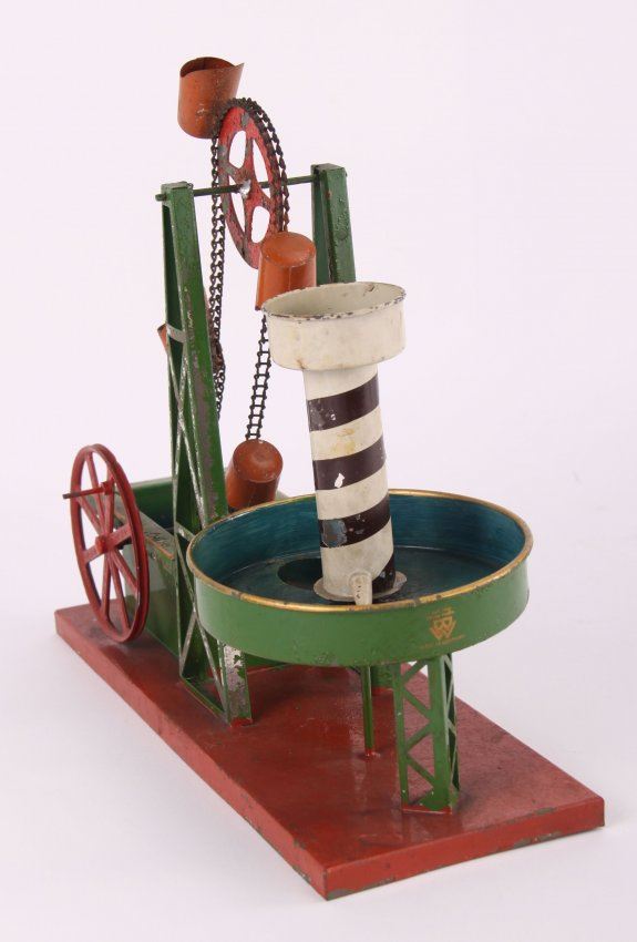 DRGM, German made tin toy, of a spinning water mill.