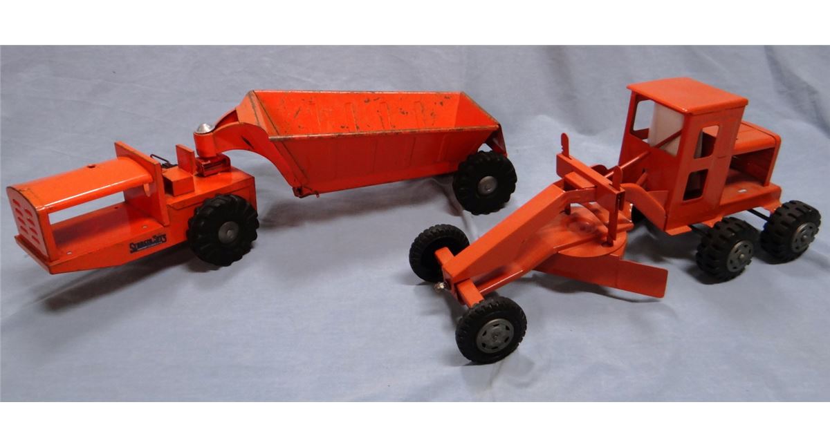 2 toys, Structo dirt scraper and unmarked road grader, no engines