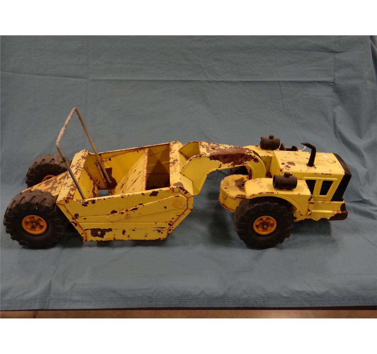 2 toy scrapers, Structo and possible Tonka, both restorable