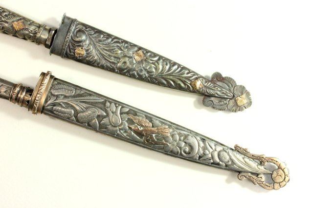 Two 14kt rose gold & silver ornate daggers