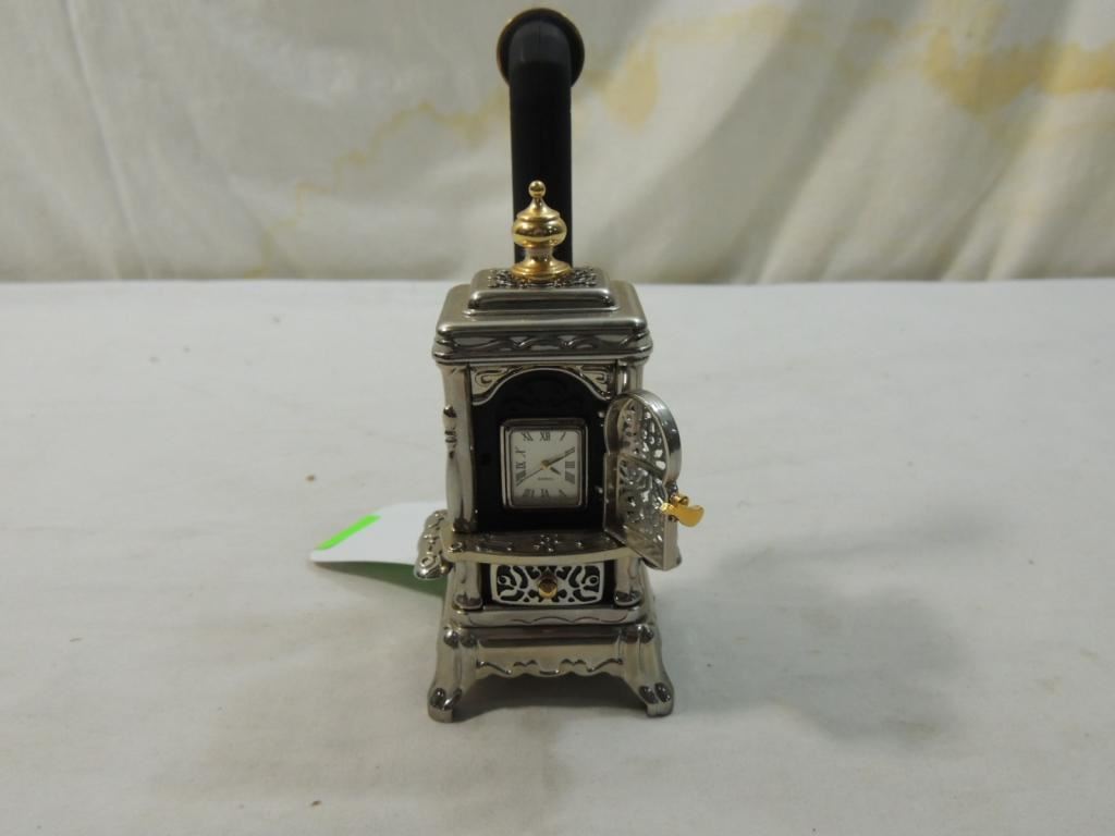 MINIATURE CLOCK ANTIQUE STOVE CLOCK