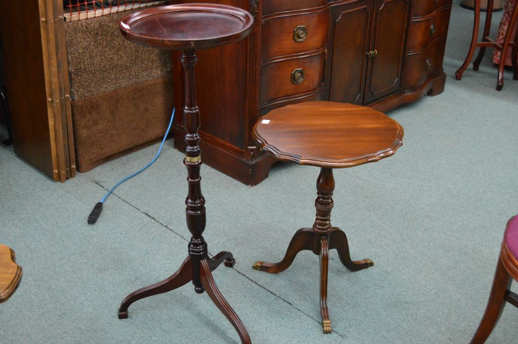 Single pedestal statuary stand and a small round tilt top table with ...