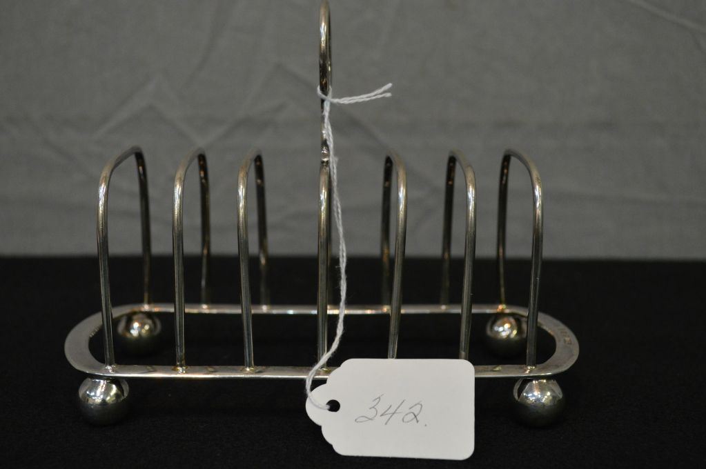 Vintage sterling silver toast rack with British hallmarks