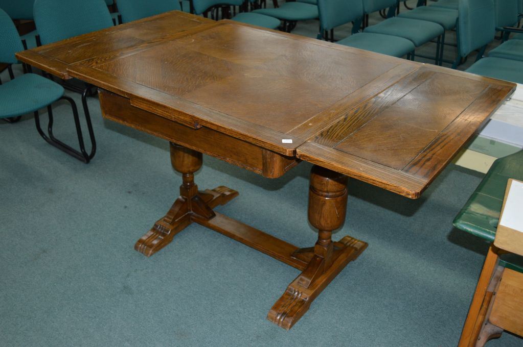 Antique quarter cut oak English draw leaf table
