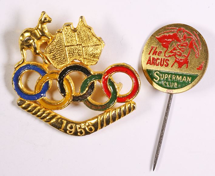 1950 The Argus Superman Club pin badge & 1956 Melbourne Olympics Enamel Badge