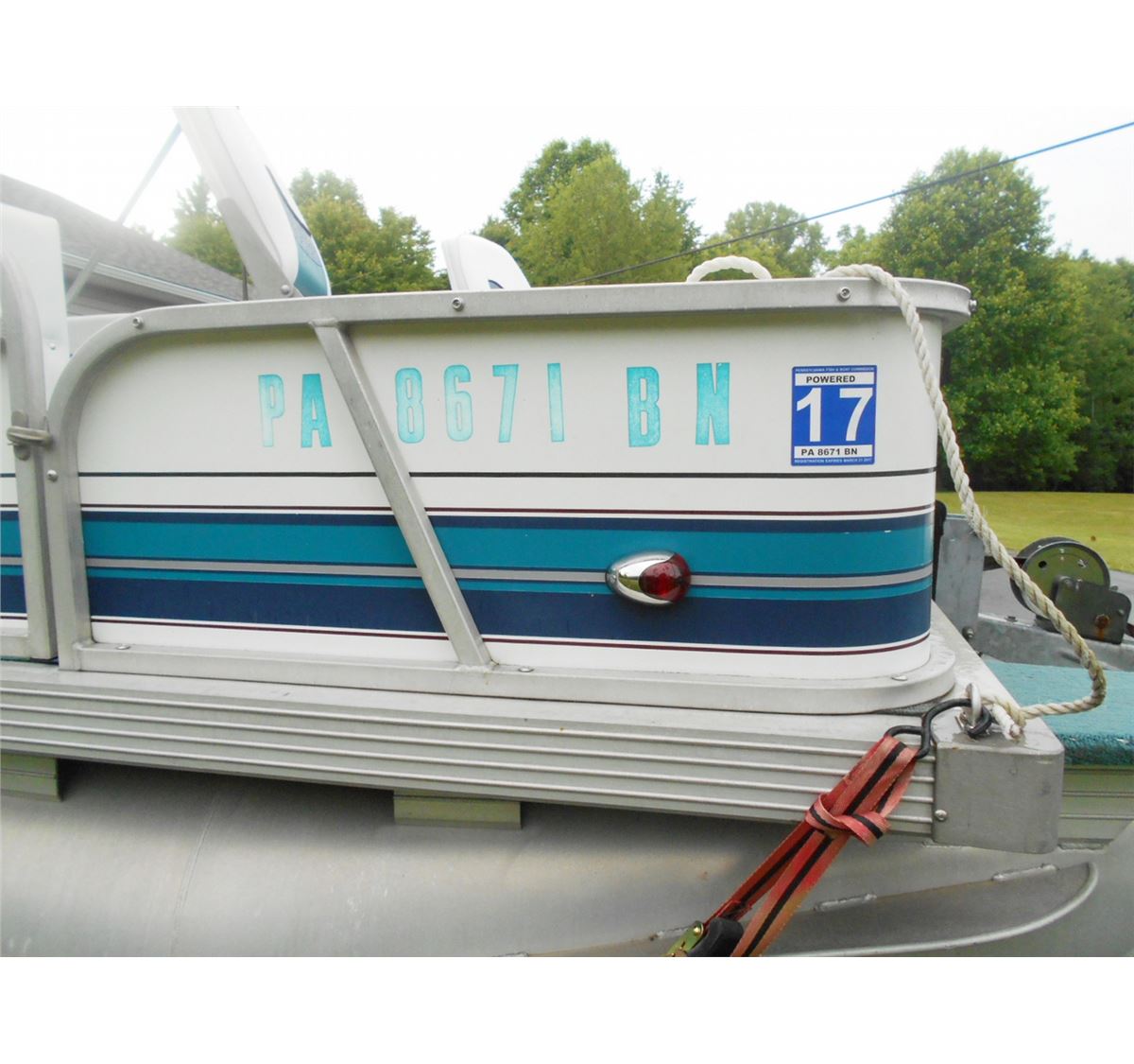 19 Ft. Spectrum pontoon boat w/ Loadrite trailer